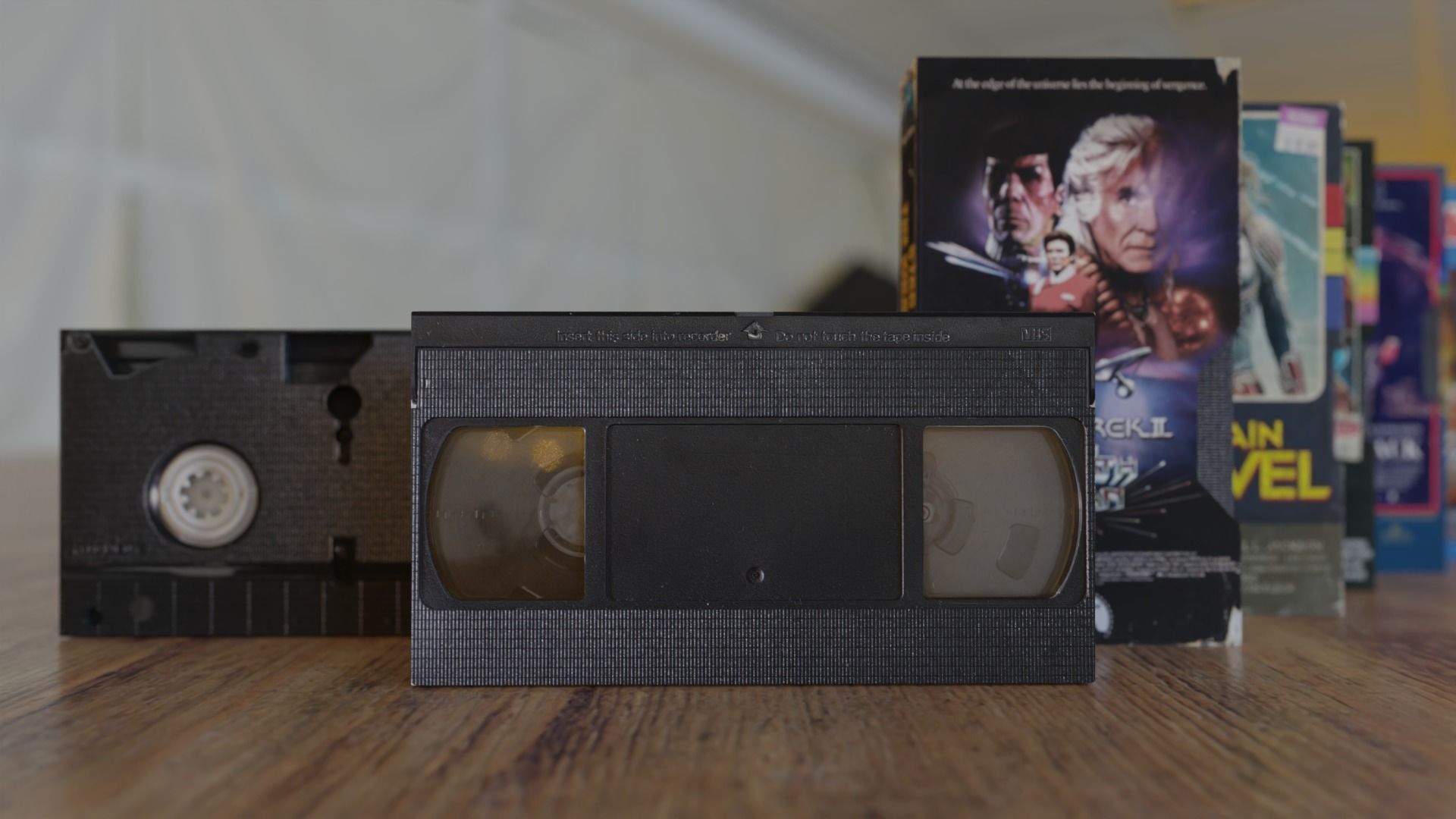 Video VHS Tape with assorted vintage box covers 3D model | CGTrader